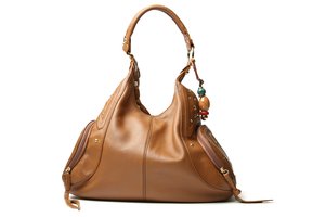 Purse in Spanish | English to Spanish Translation - SpanishDictionary.com